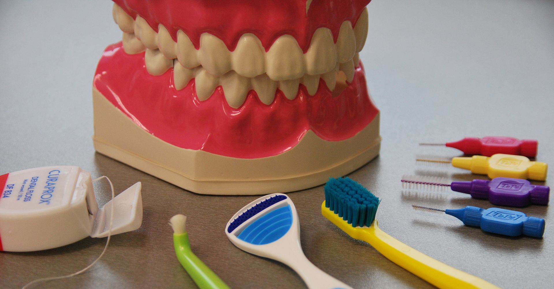 How To Floss (Your Ultimate Guide - 2023) | Smiles Dental Group